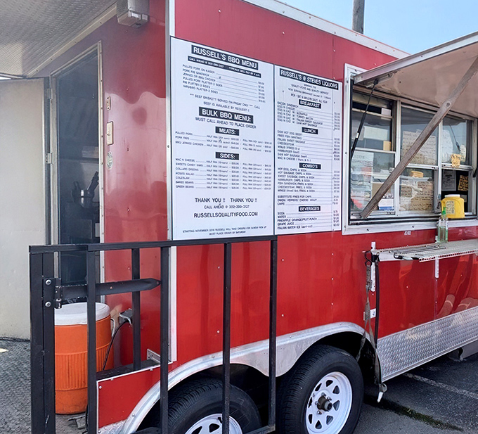 A fiery red beacon of barbecue bliss! Russell's food truck stands ready to satisfy your smoky cravings, with a menu that'll make your taste buds do a happy dance.