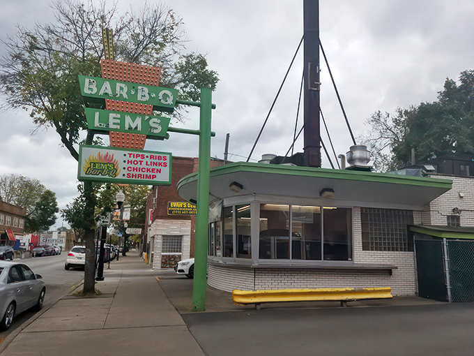 Welcome to barbecue nirvana! Lem's iconic green sign beckons like a smoky siren, promising ribs that'll make you forget your own name.