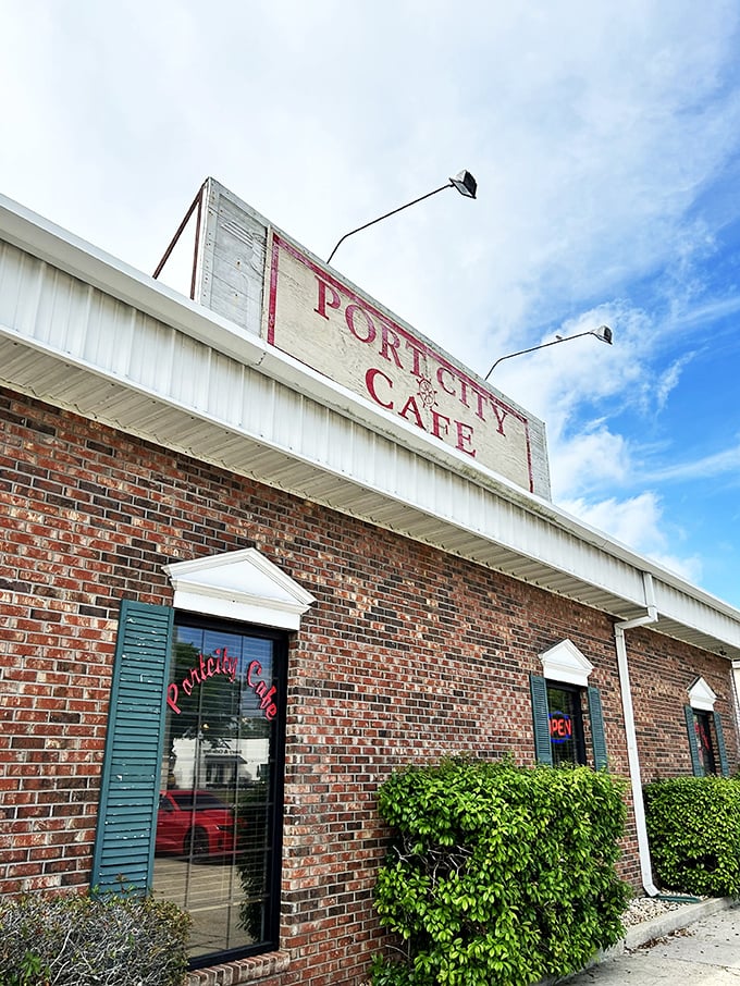 Welcome to Port City Cafe, where the sign promises good eats and the brick exterior whispers "local gem." This unassuming facade hides a breakfast lover's paradise.