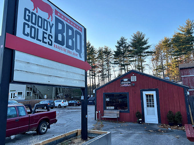 A red barn that promises barbecue bliss? It's like finding a meaty oasis in the New Hampshire wilderness!