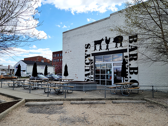 Welcome to barbecue heaven! Saucy's exterior is a carnivore's dream come true, with farm animal silhouettes promising a meaty feast inside.