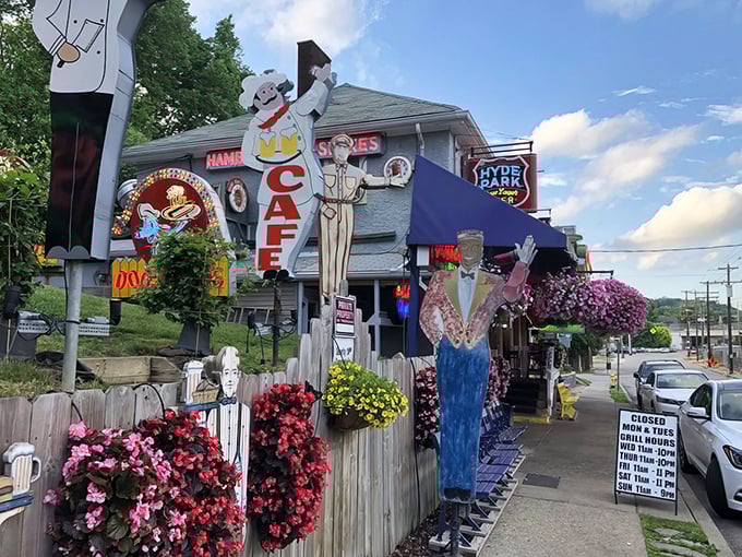 Welcome to neon nirvana! The Turf Club's exterior is a kaleidoscope of kitsch, where every sign tells a story and flowers bloom in defiance of urban sprawl.