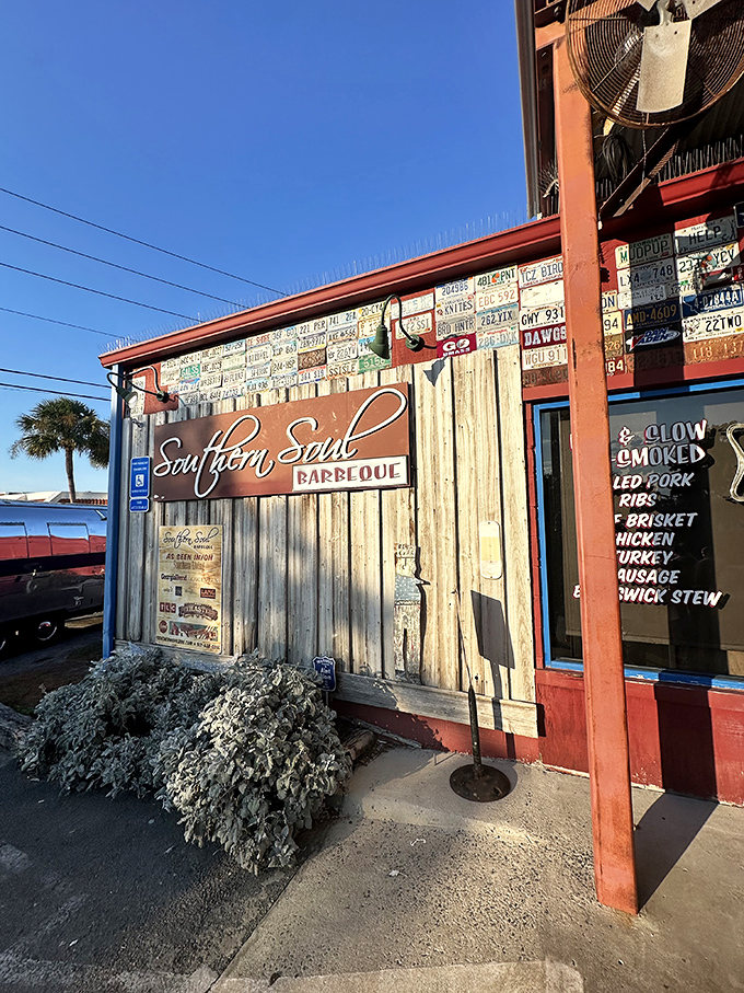 Welcome to barbecue paradise! Southern Soul's exterior is a rustic symphony of weathered wood, license plates, and the promise of smoky delights.
