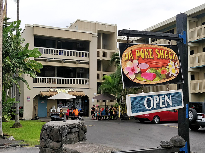 Welcome to Da Poke Shack, where the thatched roof says "tropical getaway" and the menu screams "seafood paradise"!