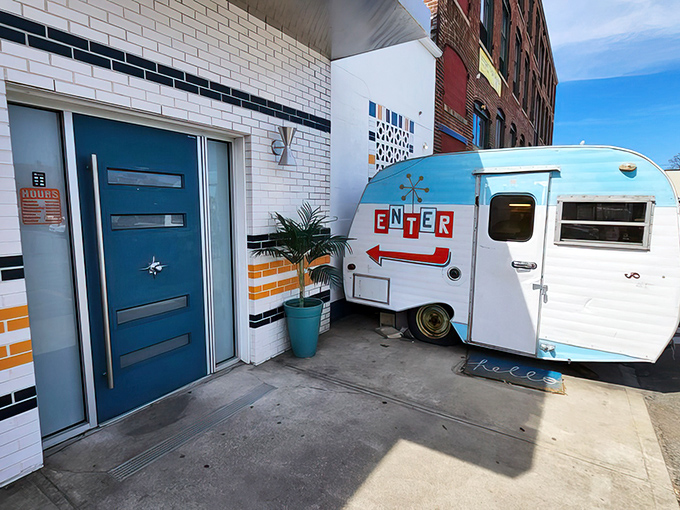 Neon dreams and trailer park schemes! Ogie's exterior glows with retro charm, inviting you into a world where kitsch is king and nostalgia reigns supreme.