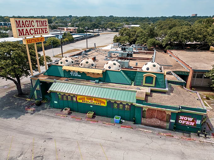 Welcome to the Magic Time Machine! This whimsical exterior looks like a cross between a medieval castle and a retro spaceship. Buckle up, time travelers!