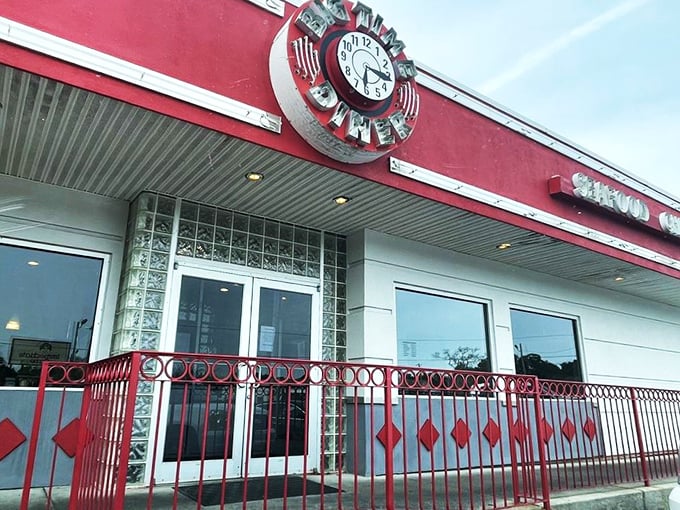 Step back in time! Big Time Diner's exterior is a cherry-red beacon of nostalgia, complete with a clock that seems to tick to the rhythm of rock 'n' roll.