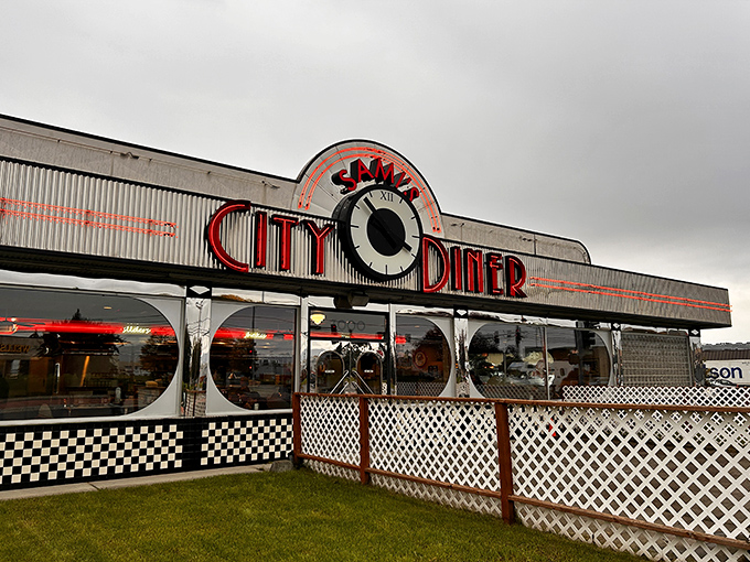 Step into a time machine disguised as a diner! Sami's City Diner's exterior promises a journey back to the fabulous '50s, complete with neon signs and retro charm.