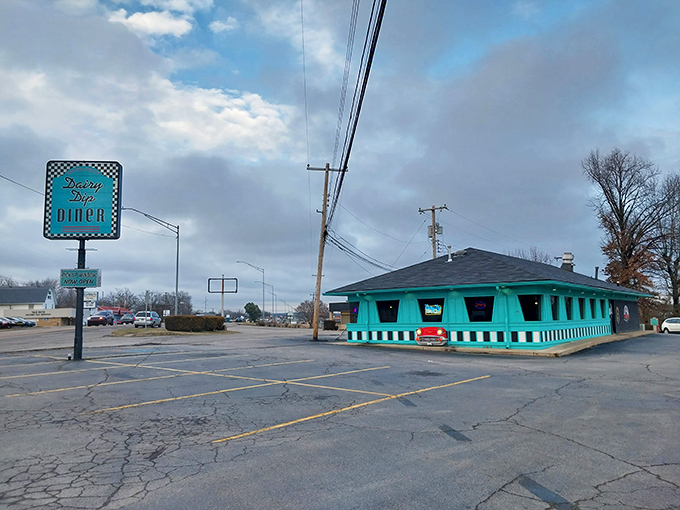 Step back in time! The Dairy Dip Diner's turquoise exterior and retro sign are like a beacon calling all milkshake lovers and nostalgia seekers to Van Buren's own slice of the 1950s.