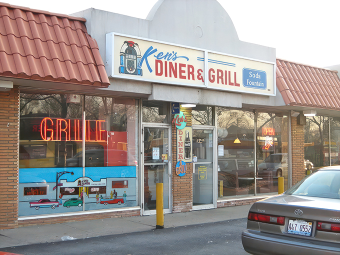 Step into a time warp! Ken's Diner & Grill's exterior is a neon-lit beacon of nostalgia, promising comfort food and a hefty dose of 1950s charm.