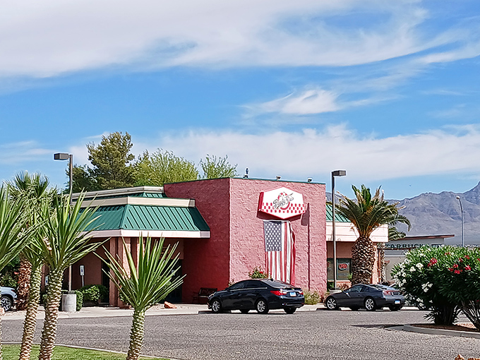 Welcome to Peggy Sue's, where the past is always present! This pink paradise stands out against the Nevada sky like a retro oasis, beckoning you to step back in time.