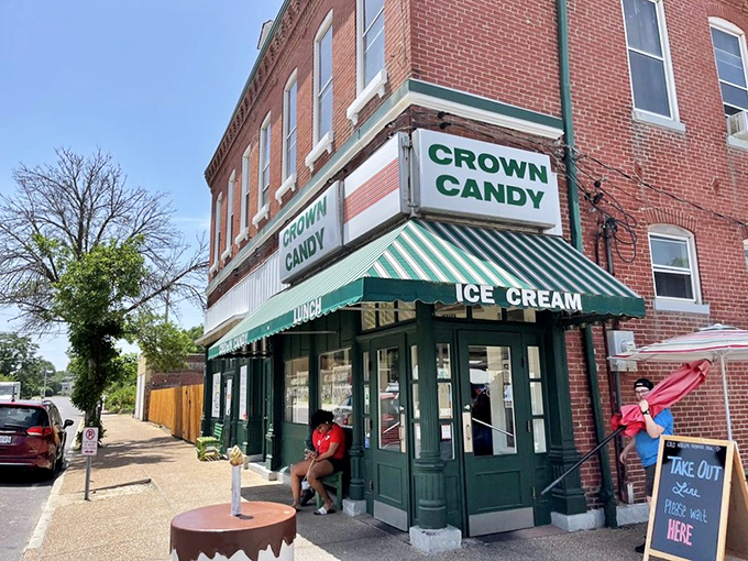 Step back in time! Crown Candy Kitchen's iconic green awning beckons like a beacon of sweetness, promising a sugary journey through St. Louis history.