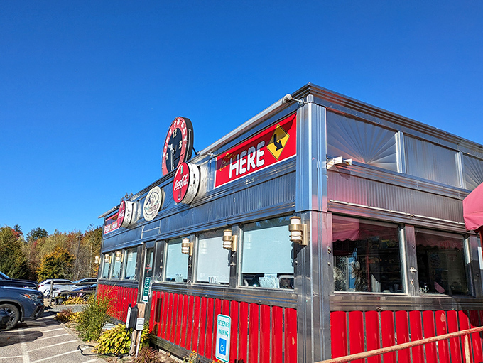 Step back in time! This retro diner's exterior is like a beacon calling all hungry time-travelers. Red, white, and chrome &ndash; the holy trinity of diner design.