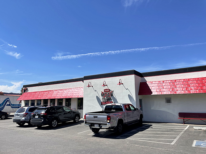 Welcome to the Moab Diner, where the 1950s never left and your diet goes on vacation. This retro gem stands proudly against the Utah sky, promising comfort food and a side of nostalgia.