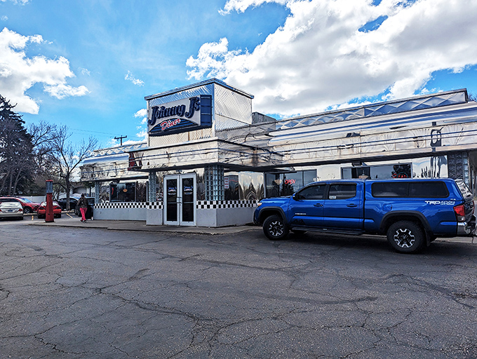Step back in time! Johnny J's Diner's gleaming exterior is like a chrome-plated time machine, whisking you straight to the fabulous fifties.