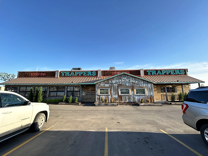 Rustic charm meets culinary adventure! Trapper's weathered exterior promises a journey into Oklahoma's flavorful frontier, where bourbon flows and appetites are conquered.