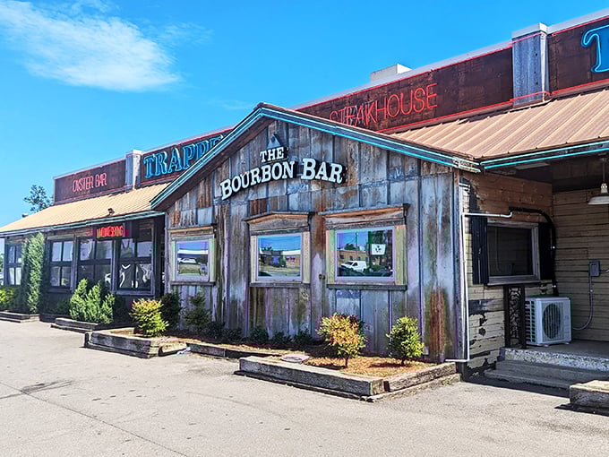 Rustic charm meets culinary adventure! Trapper's weathered exterior promises a journey into Oklahoma's flavorful frontier, where bourbon flows and appetites are conquered.