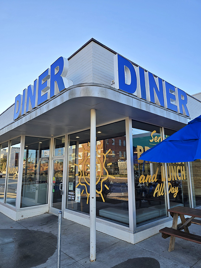 A diner so inviting, it's like a warm hug for your stomach! This retro-chic facade promises all-day breakfast bliss and lunch that'll make you forget about dinner.