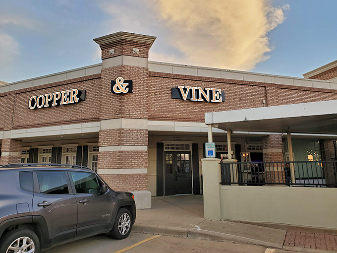 Welcome to Copper & Vine, where brick and mortar meet culinary magic. This unassuming exterior houses a world of flavor waiting to be discovered.