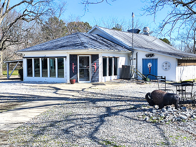 The unassuming white exterior with that iconic blue door is like a culinary TARDIS—modest on the outside, but containing breakfast universes within.