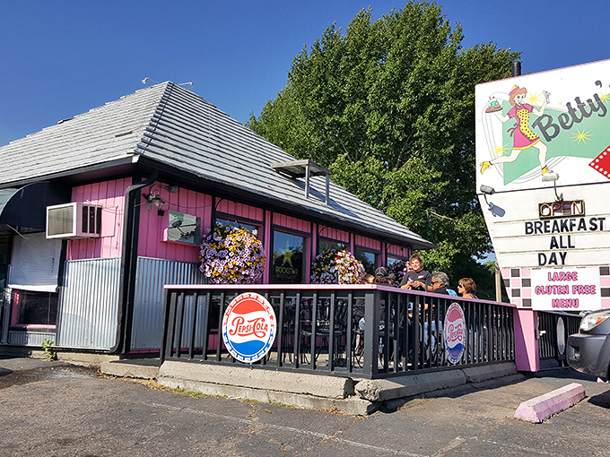 Step back in time! Betty's Diner's retro exterior, complete with a sassy cartoon waitress, promises a trip down memory lane and some seriously good eats. 