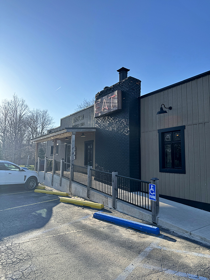 "EAT" indeed! This neon sign isn't just an invitation; it's a command from the culinary gods. Heston Supper Club's brick exterior promises Midwest charm with a side of deliciousness. 