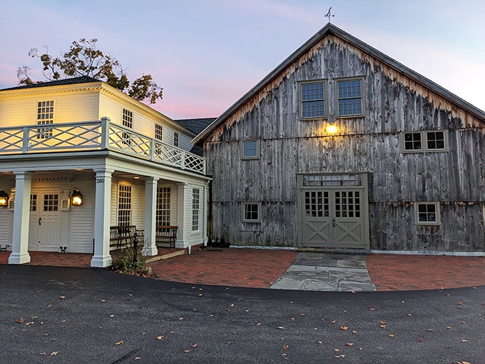 A colonial time capsule with a culinary twist! The Salem Cross Inn's pristine white exterior promises a journey through history &ndash; and your taste buds are invited along for the ride.