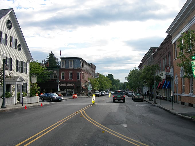 Woodstock's town center: Where Norman Rockwell meets modern-day charm. Cobblestone streets and historic buildings create a scene so quaint, you'll swear you've stepped into a postcard.