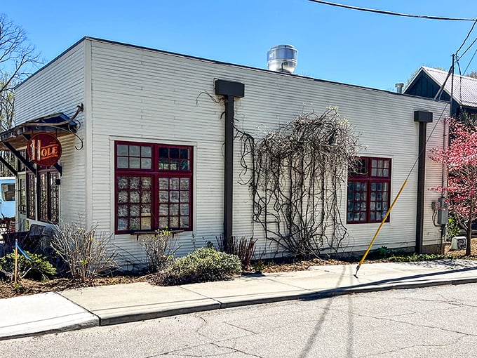 A doughnut oasis in Asheville! This unassuming exterior hides a world of fried dough delights. It's like finding Willy Wonka's factory, but for grown-ups who prefer their sugar rings golden and crispy.