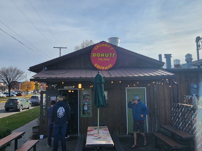 Welcome to donut paradise! This charming wooden exterior hides a world of sugary delights that would make Willy Wonka jealous.