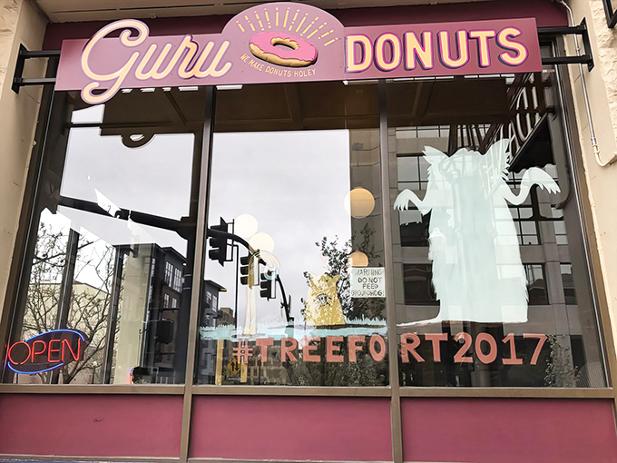 Welcome to donut nirvana! Guru Donuts' charming storefront promises a journey into fried dough paradise, where calories don't count and happiness is glazed.