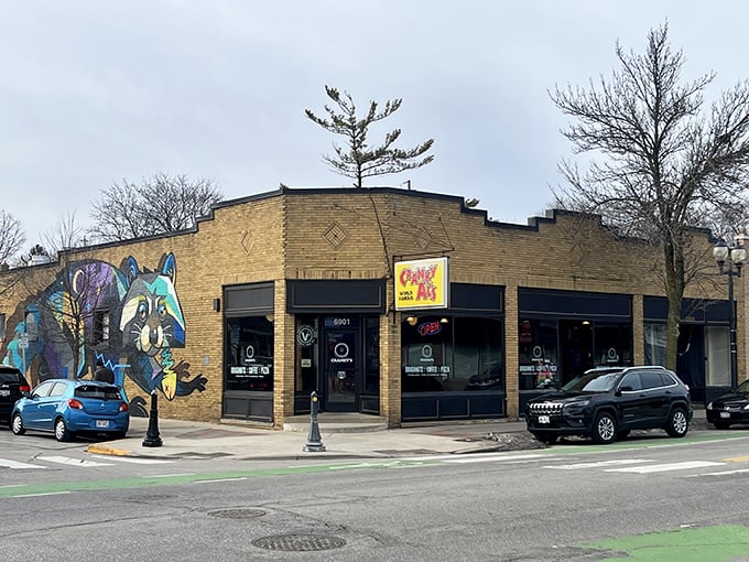 Donut-lovers, behold your Mecca! Cranky Al's exterior is a feast for the eyes, with its vibrant mural and inviting storefront. It's like Willy Wonka's factory, but for grown-ups who prefer their sugar rings fried.