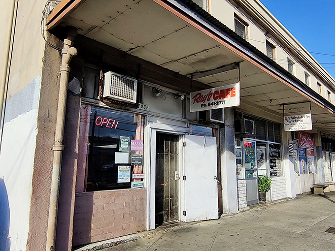 Welcome to Ray's Cafe, where the neon "OPEN" sign isn't just an invitation&mdash;it's a promise of culinary adventure!