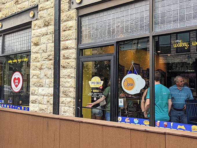 Welcome to breakfast paradise! The Chef's inviting exterior promises a feast for the senses, with its charming stone facade and playful window decals.