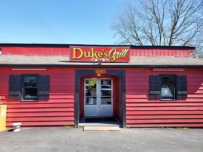 A red beacon of breakfast bliss! Duke's Grill stands proud, promising comfort food that'll make your taste buds do a happy dance.