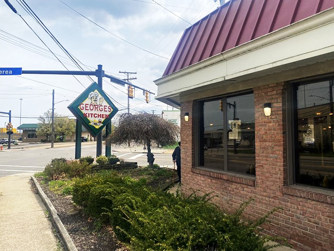 Welcome to George's Kitchen, where the neon sign is as warm as the hospitality inside. This unassuming brick facade hides a treasure trove of culinary delights that'll make your taste buds do a happy dance.