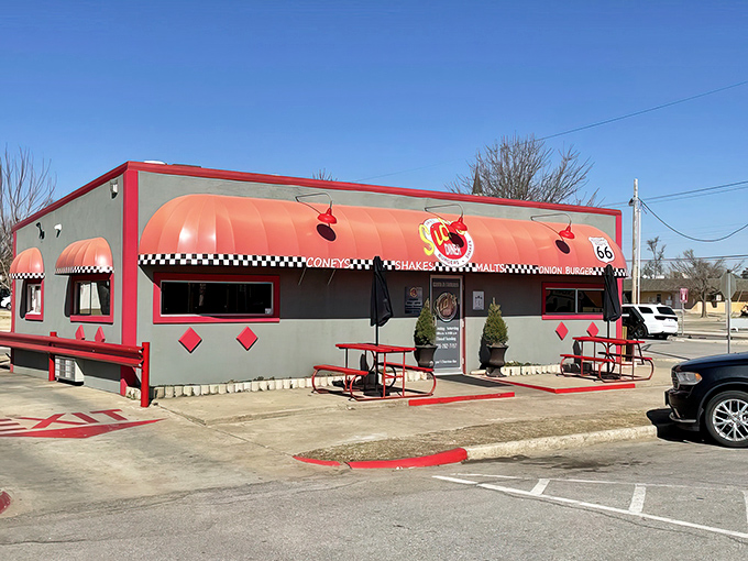 Route 66 meets comfort food heaven! Sid's Diner's red-trimmed exterior promises a journey back to the golden age of American diners.