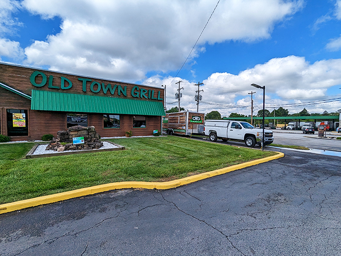 Welcome to flavor town! Old Town Grill's rustic charm and inviting green awning promise a feast for both the eyes and the taste buds.