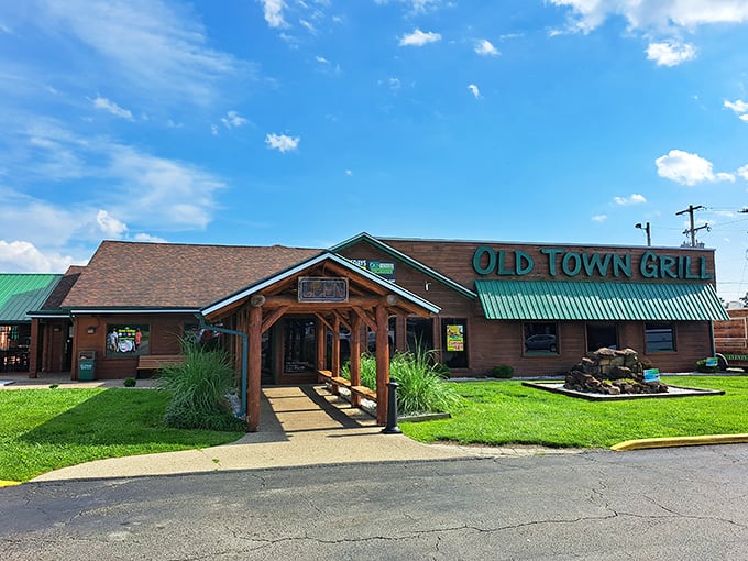 Welcome to flavor town! Old Town Grill's rustic charm and inviting green awning promise a feast for both the eyes and the taste buds.