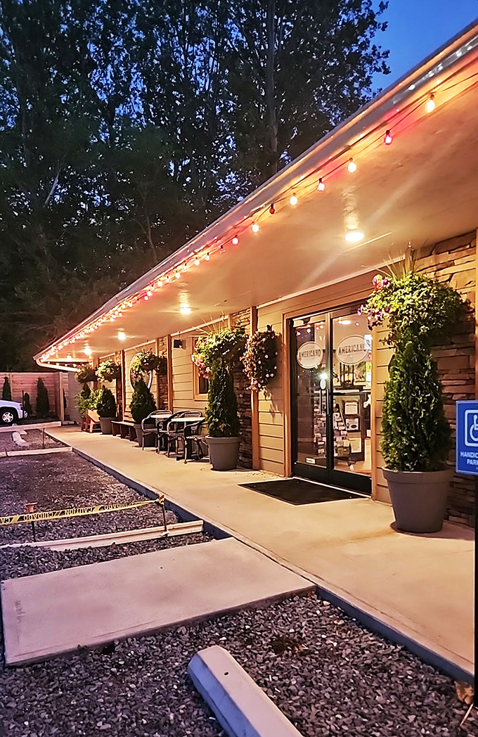 Welcome to flavor town! Americano's charming exterior, with its vibrant flowers and twinkling lights, promises a feast for both eyes and taste buds. 