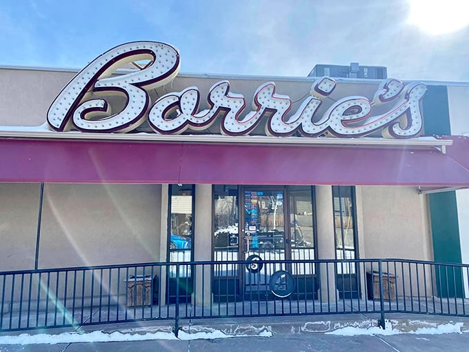 "Borrie's" in neon: a siren call for steak lovers. This sign doesn't just glow; it beckons with the promise of meaty delights. 