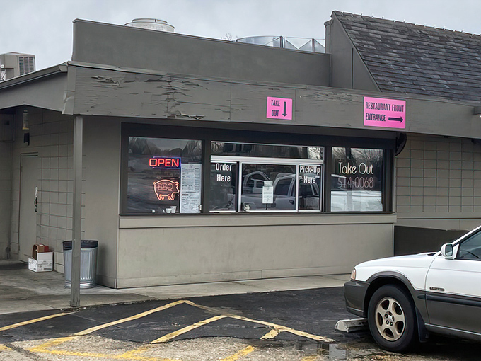Don't judge this BBQ book by its cover! Behind that unassuming exterior and those bright pink signs lies a smoky paradise worth every carnivorous mile.