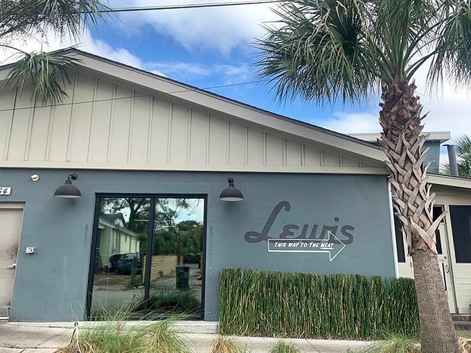 Welcome to Flavor Town: Step into the unassuming charm of this beloved barbecue spot. The smell of smoke whispers secrets of slow-cooked delights.