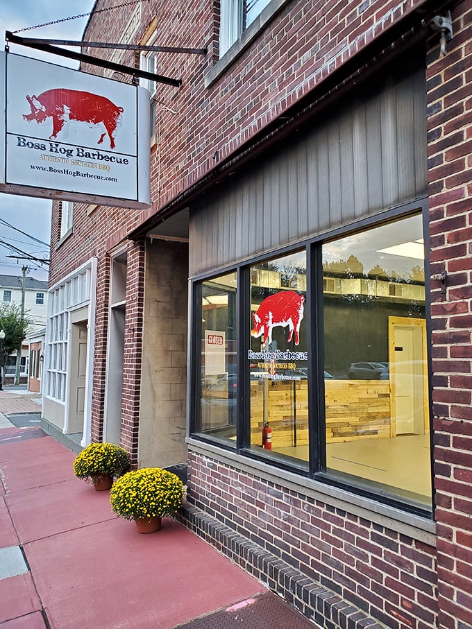 Welcome to hog heaven! Boss Hog Barbecue's unassuming exterior hides a world of smoky delights, proving you can't judge a book by its brick cover.