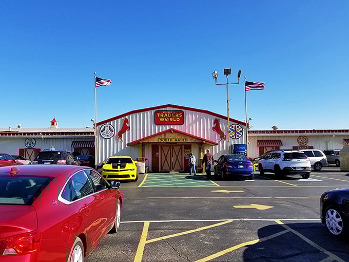 The iconic South Main entrance to Traders World, complete with its signature red horses&mdash;like sentinels guarding a treasure trove of bargains within.
