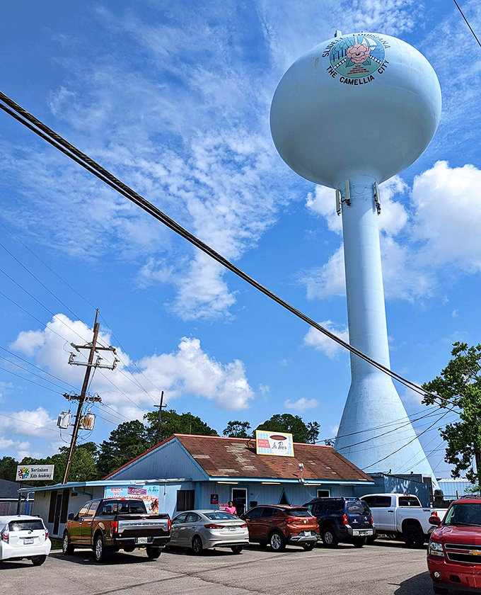 Blue skies and comfort food dreams! La Pines Cafe's exterior is like a retro postcard come to life, promising delicious adventures within.