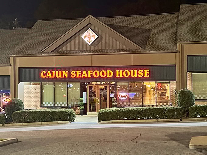 Neon dreams and seafood schemes! This unassuming strip mall facade hides a treasure trove of Cajun delights that'll make your taste buds do a happy dance.