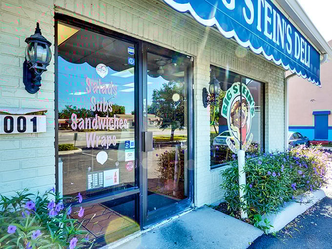 Welcome to sandwich paradise! Big Stein's Deli's cheery blue awning beckons like a siren song to hungry passersby. Resistance is futile, my friends.
