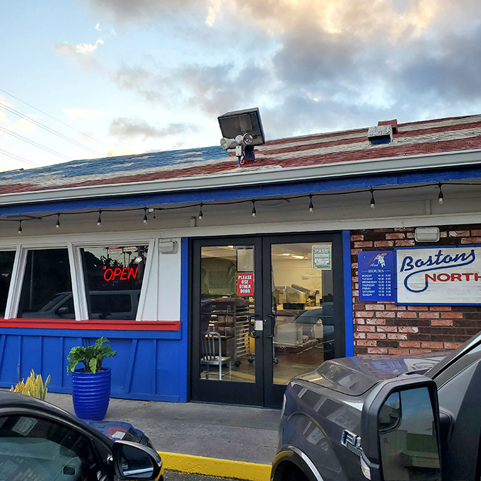 Welcome to pizza paradise! Boston's North End Pizza Bakery stands proud, its blue-trimmed exterior promising a slice of heaven in the heart of Aiea.