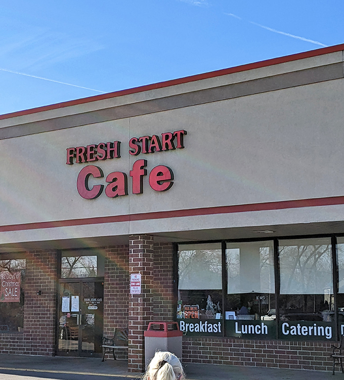 A beacon of breakfast bliss! Fresh Start Cafe's bold red sign promises a morning adventure that'll make you forget hitting the snooze button was ever an option.